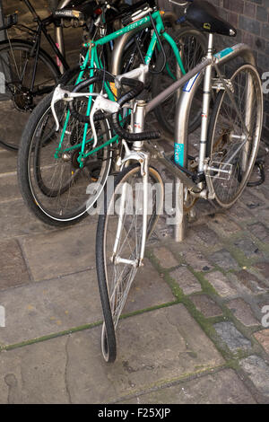 A bicycle with buckled wheel Stock Photo - Alamy