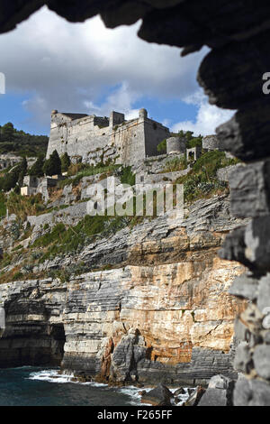 Doria Castle through an archway at Portovenere Stock Photo - Alamy