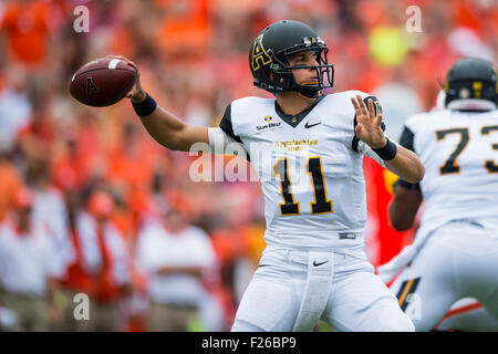 Appalachian State quarterback Taylor Lamb runs the ball against Toledo ...