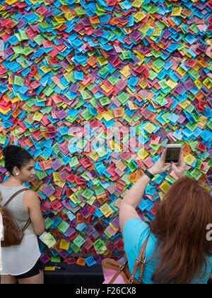 Wall of wish list stickers Stock Photo - Alamy