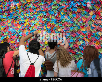 Wall of wish list stickers Stock Photo - Alamy