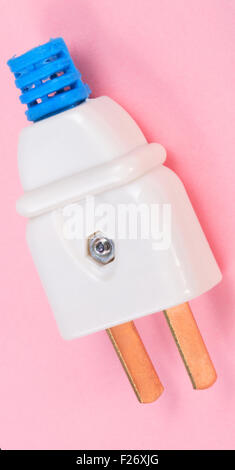 American Outlet Plug on pink background Stock Photo - Alamy