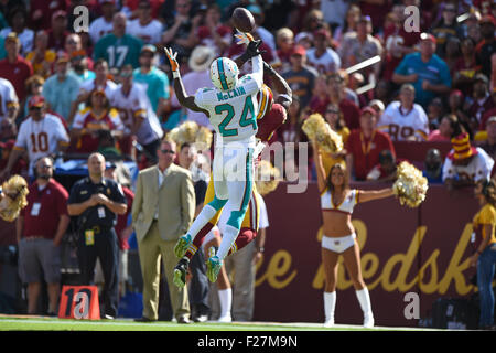 Miami Dolphins defensive back Brice McCain (24) intercepts a pass ...