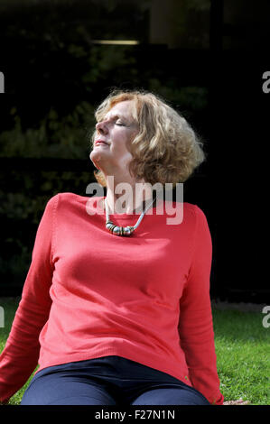Beautiful middle age woman wearing leopard animal print dress looking ...