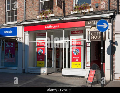 ladbrokes bookies betting shop store sign logo Stock Photo - Alamy