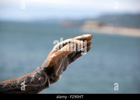 Hand of a bronze statue, Trieste Stock Photo - Alamy