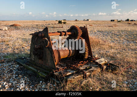 Abandoned fishing boat and winch on Dungeness shingle beach Kent Stock ...