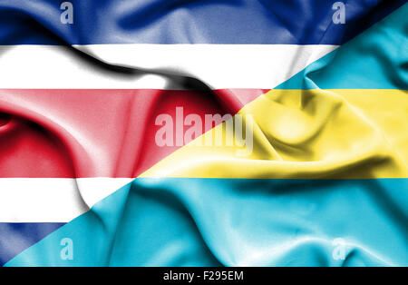 Costa Rica and Bahamas flags. 3D Waving flag design. Costa Rica Bahamas ...