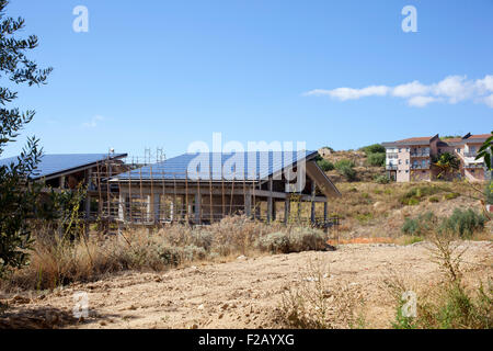Solar panels in a house under construction, Italy Stock Photo - Alamy