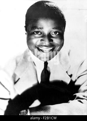 LOUIS JORDAN (1908-1975) US musician with his Tympany Five band about ...