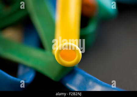 A lot of toy ballons deflated Stock Photo - Alamy