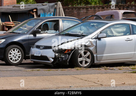 Car with front end collision damage - USA Stock Photo - Alamy