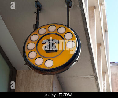 Old italian public telephone sign Stock Photo - Alamy