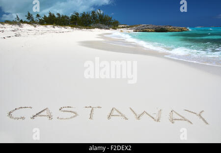 Castaway writing on a desrt beach of Little Exuma, Bahamas Stock Photo ...