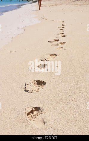 Footwear print on the sandy beach Stock Photo - Alamy