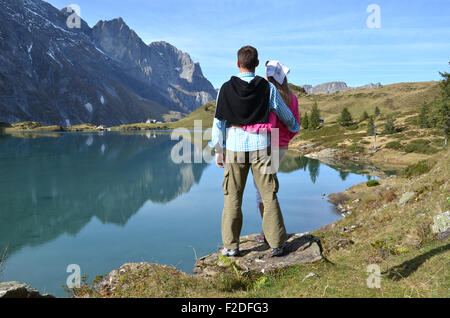 Young couple enjoying Alpine panorama. Switzerland Stock Photo - Alamy