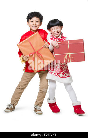 Happy children celebrating Chinese new year Stock Photo - Alamy