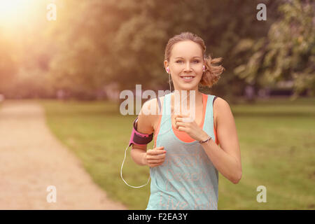 Half Body Shot of an Athletic Young Woman Showing her Arm Muscles ...