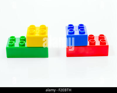 Colorful plastic building bricks on isolated white background Stock ...