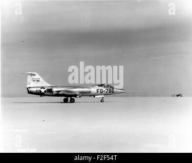 The Lockheed XF-104, serial number 53-7786, is shown during its flight ...