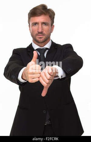 Thumbs up. Serious guy give thumb. Handsome man show approval sign ...