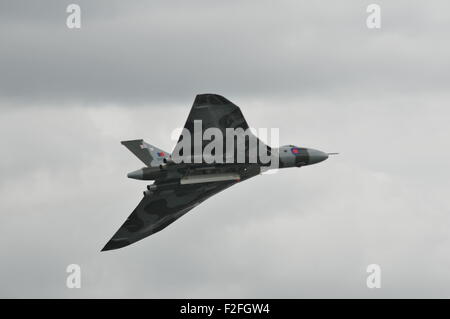 Avro Vulcan XH558 flying from right to left, dark cloudy sky Stock ...