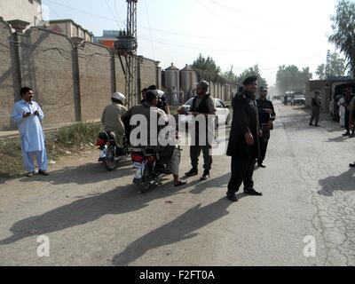 Peshawar. 18th Sep, 2015. A Pakistani security personnel takes position ...