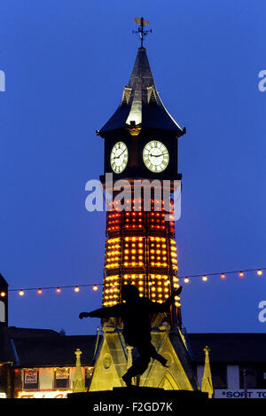Clock Tower and the Jolly Fisherman statue at night. Skegness ...