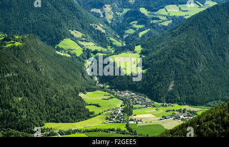 Small Village in the Austrian Alps with a Clear Lake and Distant ...