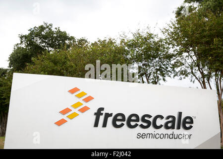 A logo sign outside of the headquarters of Freescale Semiconductor Inc ...