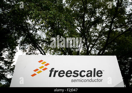 A logo sign outside of the headquarters of Freescale Semiconductor Inc ...