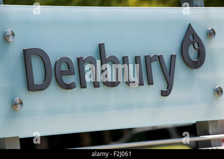 A logo sign outside of the headquarters of Denbury Resources, Inc., in ...