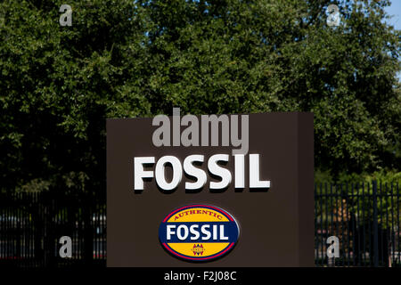 A logo sign outside of the headquarters of Fossil Group, Inc., in Stock ...