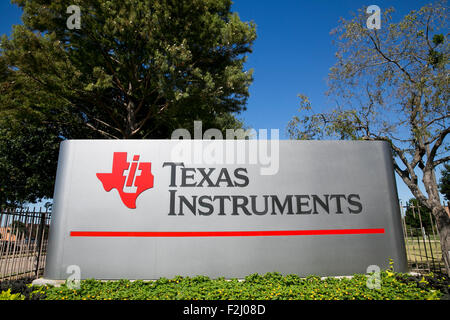 A logo sign outside of the headquarters of Texas Instruments in Stock ...