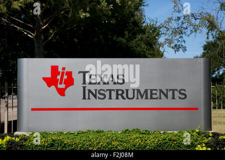 A logo sign outside of the headquarters of Texas Instruments in Dallas ...