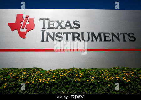 A logo sign outside of the headquarters of Texas Instruments in Stock ...