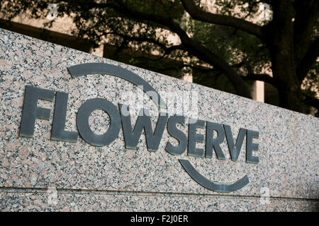A logo sign outside of the headquarters of The Flowserve Corporation in ...