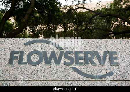 A logo sign outside of the headquarters of The Flowserve Corporation in ...