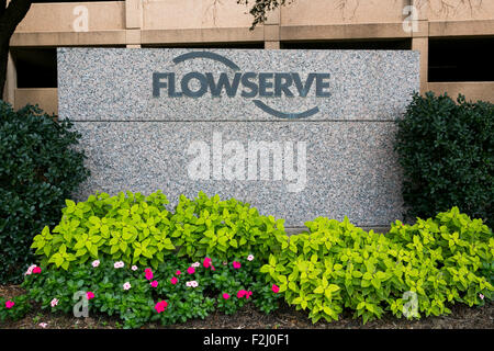 A logo sign outside of the headquarters of The Flowserve Corporation in ...