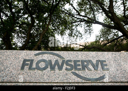 A logo sign outside of the headquarters of The Flowserve Corporation in ...