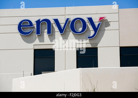 A logo sign outside of the headquarters of Envoy Air Inc., the parent ...