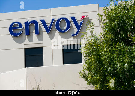 A logo sign outside of the headquarters of Envoy Air Inc., the parent ...