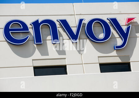 A logo sign outside of the headquarters of Envoy Air Inc., the parent ...