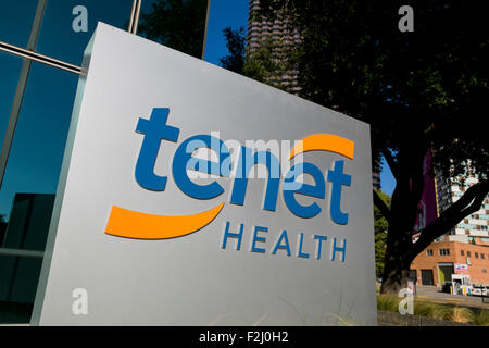 A logo sign outside of the headquarters of the Tenet Healthcare ...