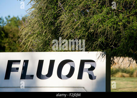 A logo sign outside of the headquarters of the Fluor Corporation in ...
