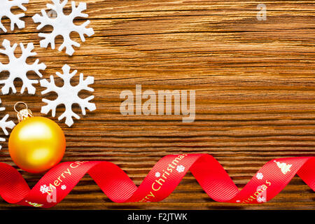 white ribbon on the wooden background with copy space. White or light ...