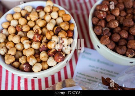 View of peeled hazelnuts inside the ceramic cups Stock Photo - Alamy