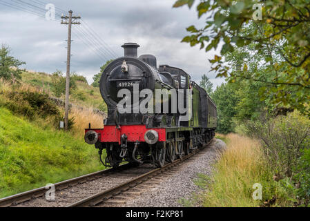 LMS Class 4F 0-6-0 'Big Goods' engine hauling a passenger train at ...