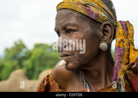 Togo, West Africa, Nadoba, tamberma somba tribe man standing in front ...