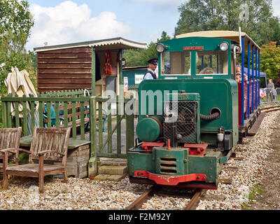 Narrow gauge Simplex industrial loco attached to passenger carriage ...